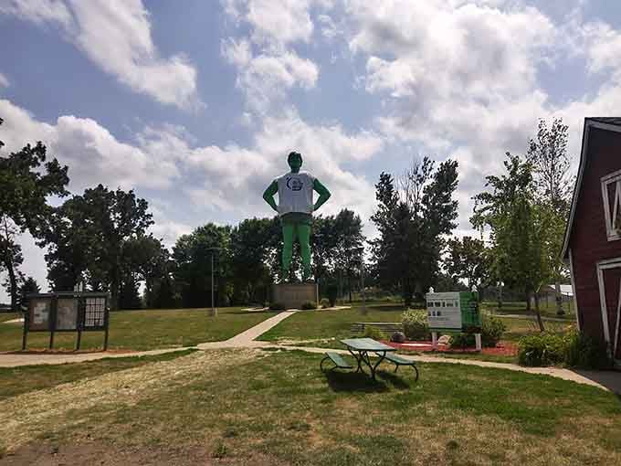 Spotted from behind, the Giant still radiates pure confidence, hands on hips, owning every inch of Blue Earth.