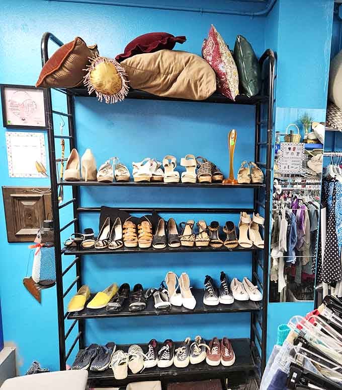 Heels, flats, sneakers, and sandals stacked floor to ceiling, because apparently Cinderella donated generously this season.