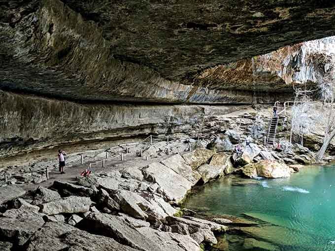 The limestone pathway leading to the grotto, where every step builds anticipation for that first glimpse.