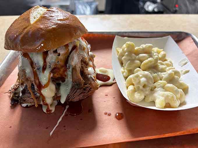 That cheese pull situation happening here is exactly why people drive across town for this sandwich magic.