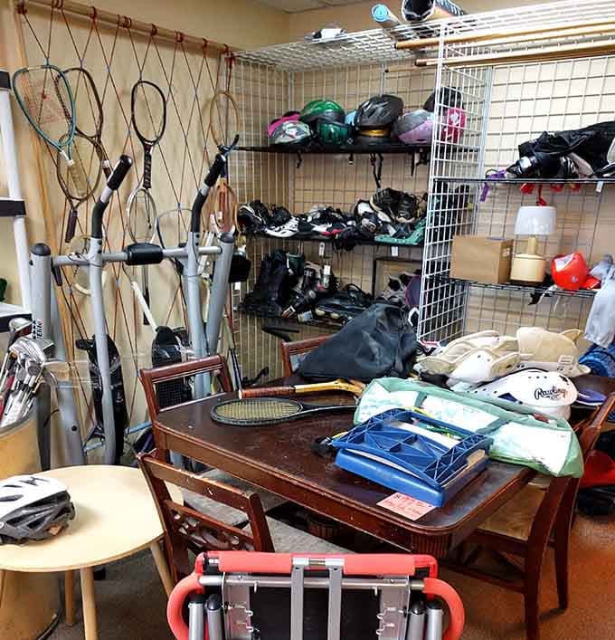 Tennis rackets, helmets, elliptical machines, and inline skates all sharing one room, basically a sporting goods store had a yard sale.