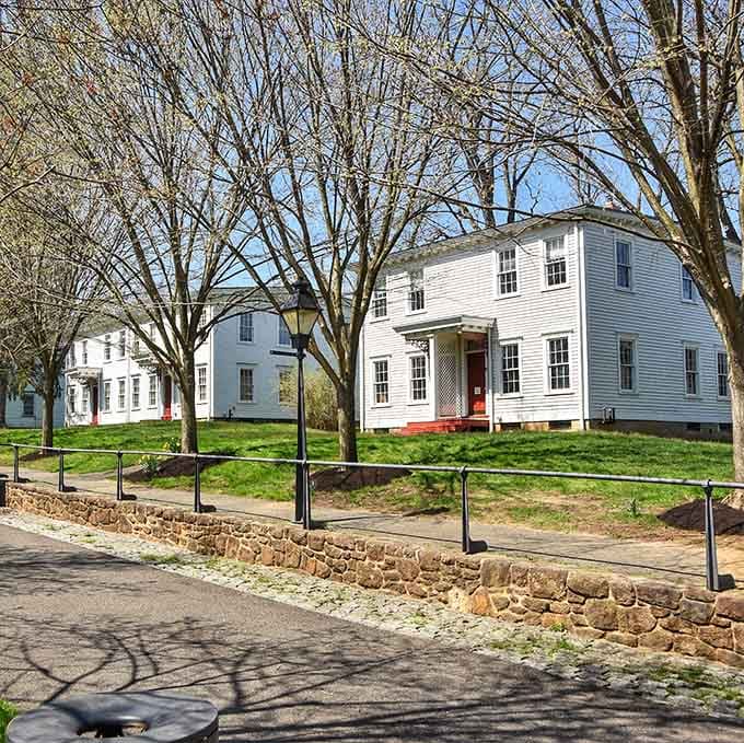 These preserved worker cottages lined along a quiet street tell the real story of everyday American life, no filter needed.