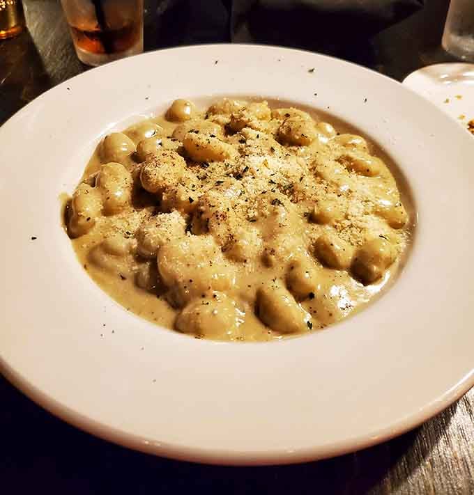 Homemade gnocchi in gorgonzola sauce so creamy and pillowy, you'll want to write it a thank-you note afterward.