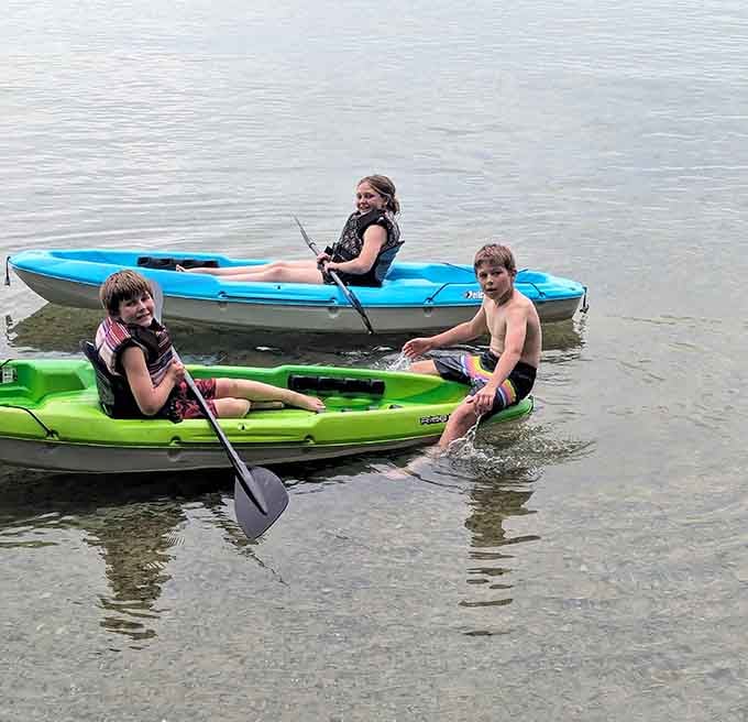 Kids on kayaks, smiles for miles. Green Lake clearly passed the fun inspection with flying colors.