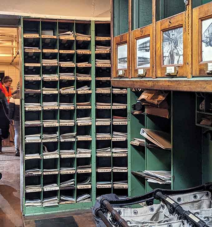 Hundreds of mail slots, each labeled with a Minnesota town name, tell a story about how connected this state once was.