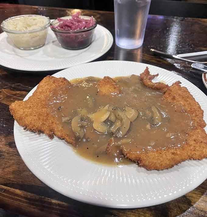Mushroom gravy so rich and generous, it practically tucks the schnitzel in for a cozy nap.