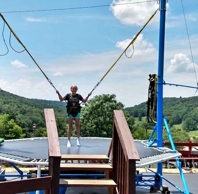 Strapped in and bouncing toward the clouds, this is what pure, unfiltered joy looks like.