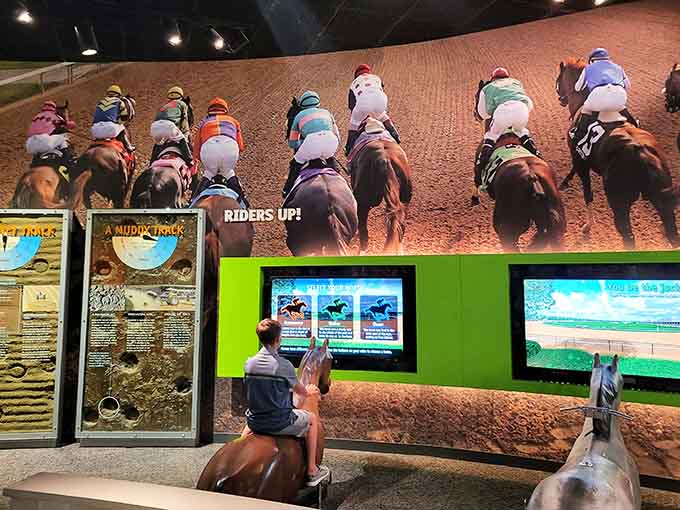 Riders up! This interactive exhibit lets you feel the starting gate tension before the whole world holds its breath.