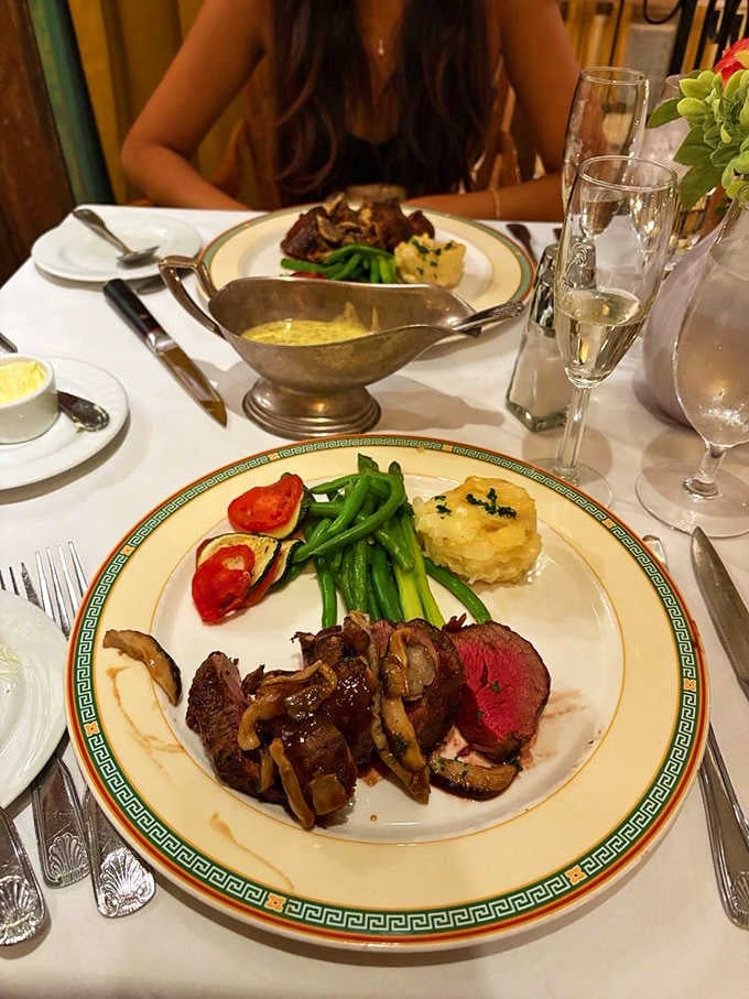 The Chateaubriand arrives carved tableside, rosy and perfect, with b&eacute;arnaise sauce standing by like a very elegant backup dancer.