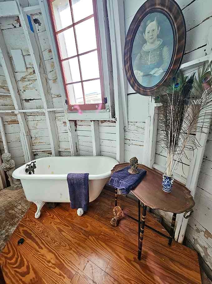 A clawfoot tub inside an elephant? Sure, why not. Lucy's had more career changes than most of us ever will.