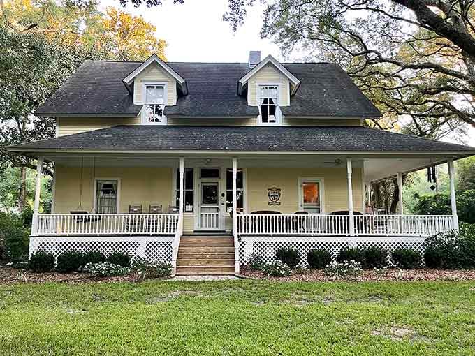 That wide wraparound porch is basically nature's way of saying, "Sit down, you're not going anywhere."