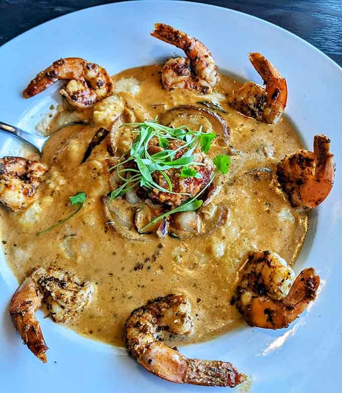 Blackened to perfection and swimming in rich sauce, these shrimp mean serious business on a cold Minnesota night.