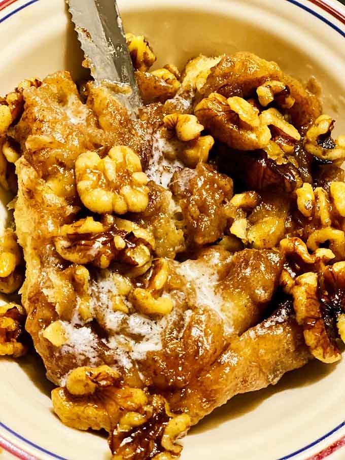 Walnuts tumbling over warm, gooey dough like they own the place, because honestly, they do.