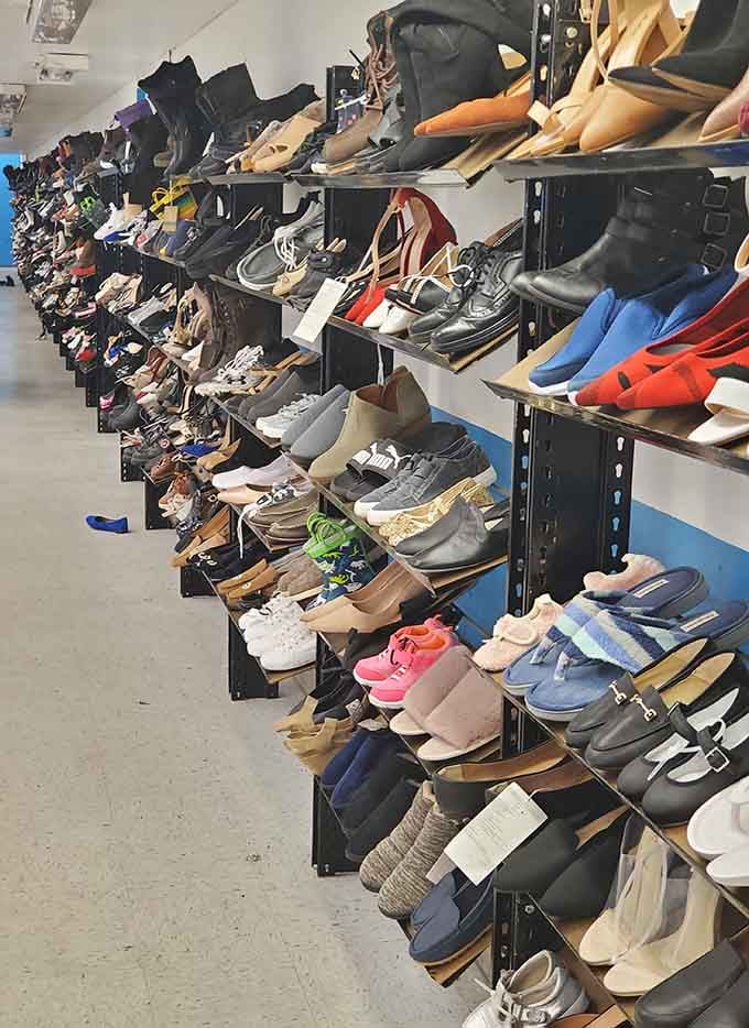 Floor to ceiling shoes of every style, color, and purpose, lined up like a very well-stocked Cinderella situation.