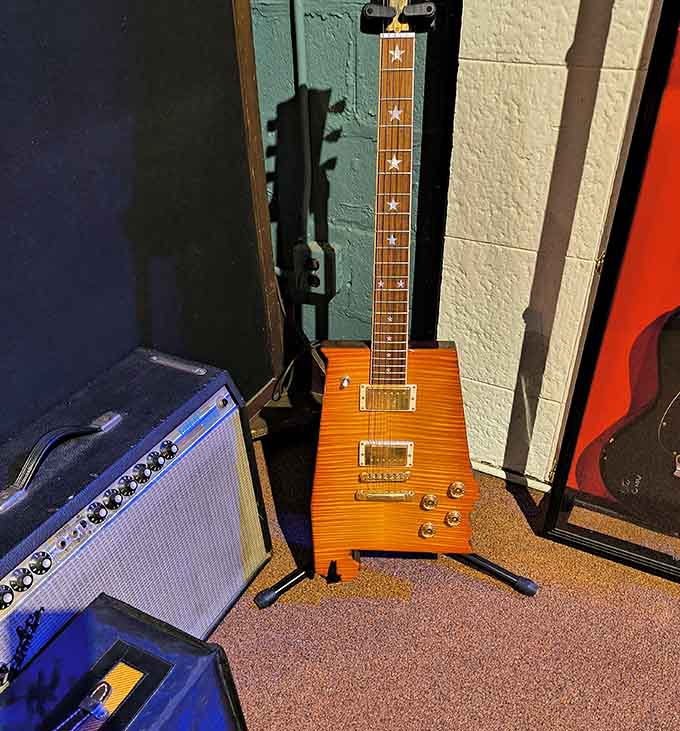 That star-inlaid neck and flame maple top make this guitar look like it belongs in a rock and roll museum. It basically does.
