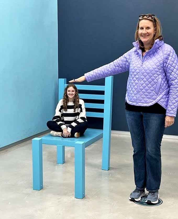 One chair, two people, zero logic. The Beuchet chair makes grown adults feel like they've shrunk in the wash.