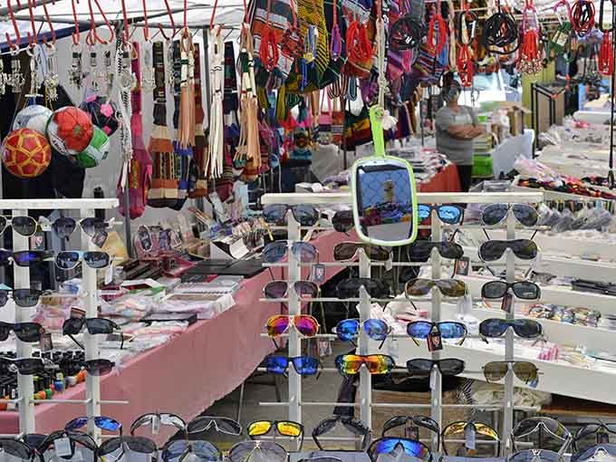 Sunglasses, jewelry, and colorful accessories packed together so tightly that even your eyes need a moment to catch up.