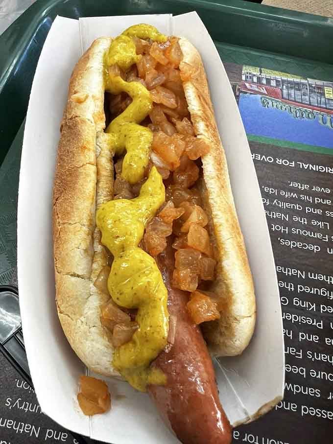 Mustard and sautéed onions on a Nathan's frankfurter is the kind of combination that makes you wonder why you ever complicated lunch.