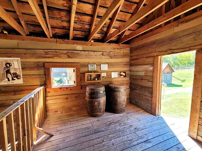 Wooden barrels inside a historic cabin. In Kentucky, even the storage containers have a good story.