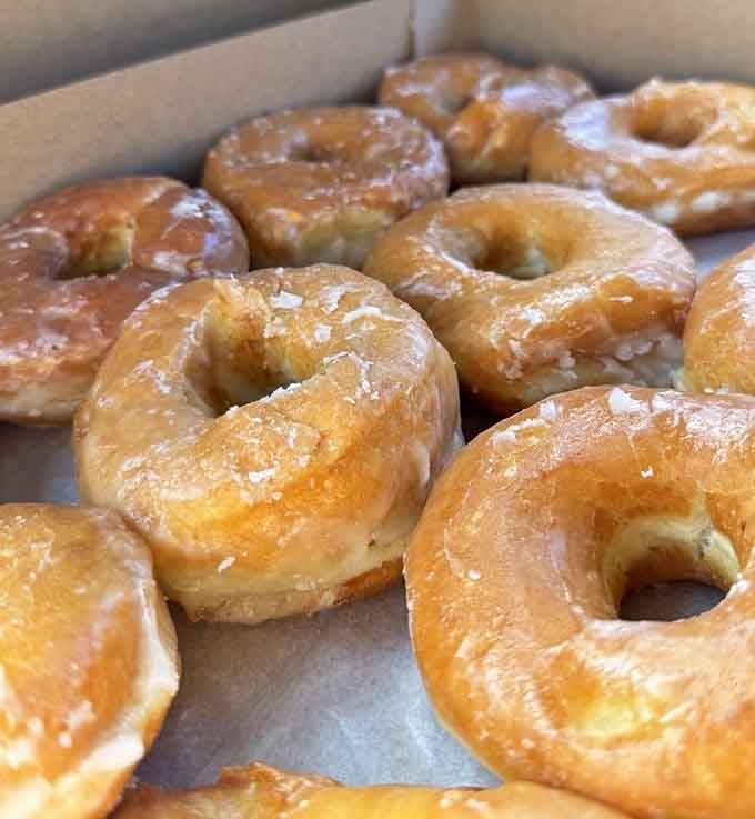 Golden, glossy, and gloriously simple. These classic glazed donuts are the reason people drive across the city.