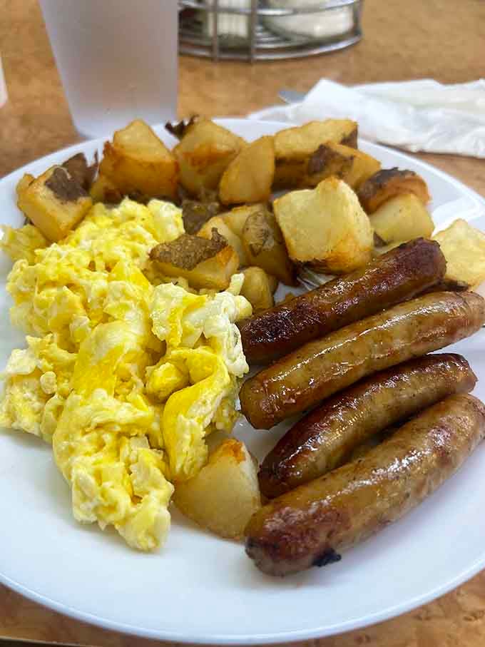 Fluffy scrambled eggs, golden home potatoes, and a lineup of sausage links so good they deserve their own spotlight.