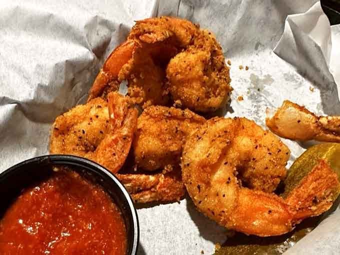 Plump, golden-fried shrimp with cocktail sauce on the side, simple pleasures done with serious skill.
