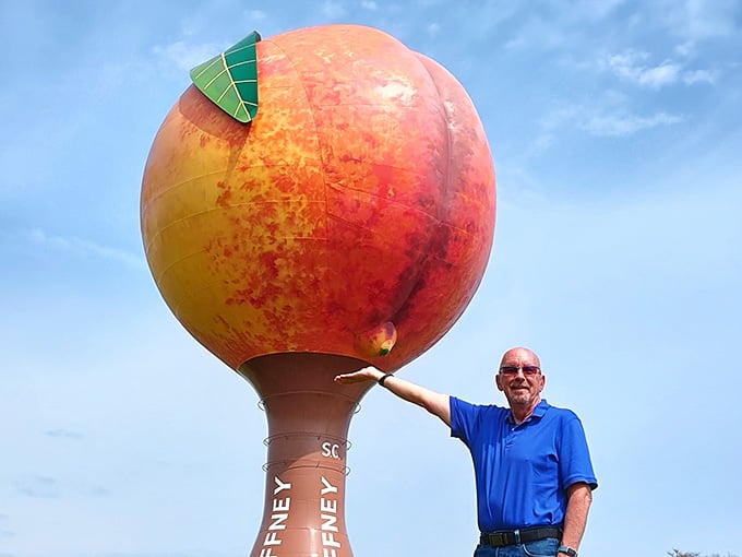 Nothing says "I was here" quite like posing with a four-story peach on a perfect summer afternoon.