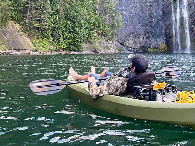 Feet up, paddle resting, waterfall straight ahead. Some office views are simply better than others.