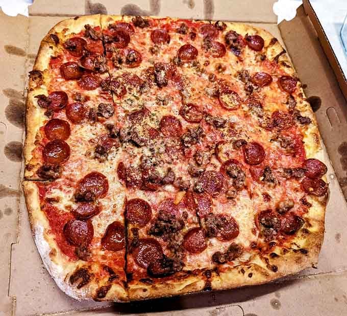Pepperoni and sausage on a perfectly charred New Haven crust. Simple, honest, and absolutely impossible to stop eating.
