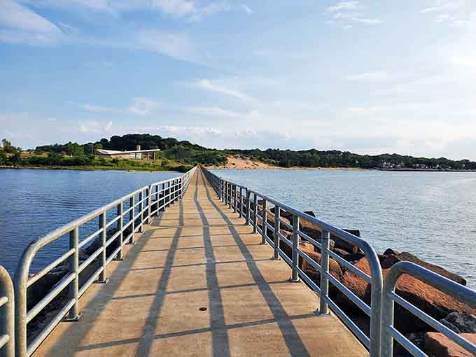 This fishing pier at Portage Lakefront stretches toward the horizon like it's daring you to follow it all the way.