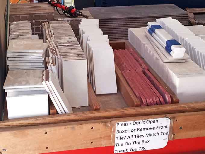 Neatly stacked salvage tiles in every shape and size, ready to give your bathroom or kitchen a serious personality upgrade.