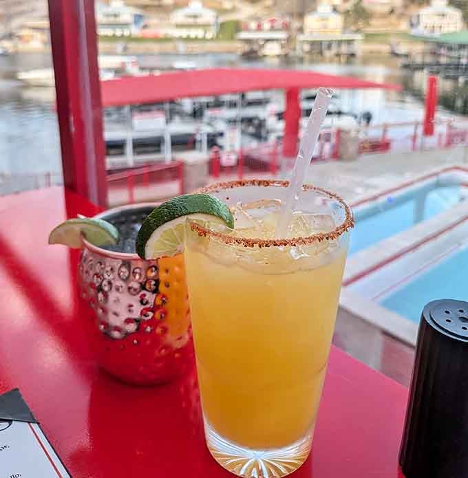 That spiced rim, that lake view behind it, this margarita at Redhead is basically a postcard you can drink.