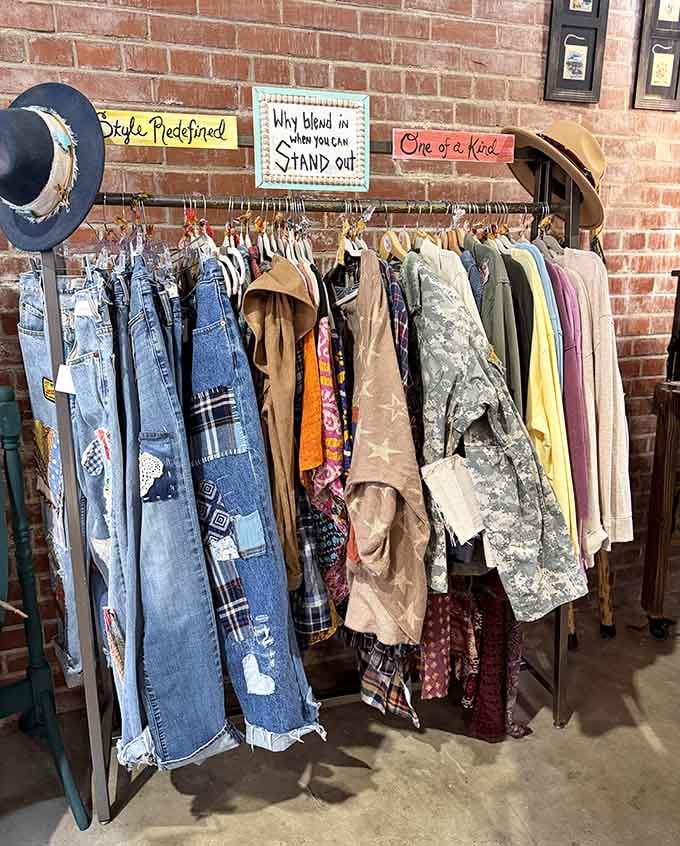 "Why blend in when you can stand out," says the sign, and the clothing rack behind it means every word of it.