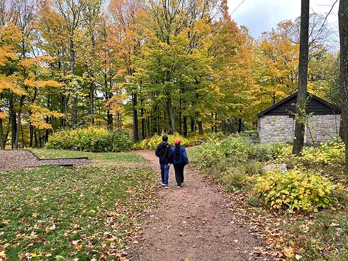 Two visitors, one unforgettable trail. Fall at Rib Mountain turns an ordinary walk into something special.