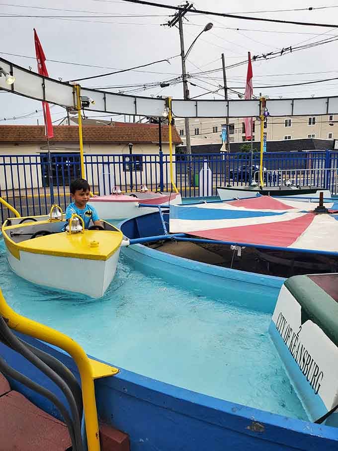 Even the youngest captains get their moment at the helm on these cheerful little boats circling the waterway.