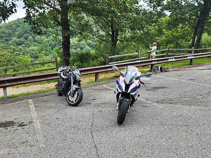 Even the parking spots come with million-dollar views along this spectacular mountain route.