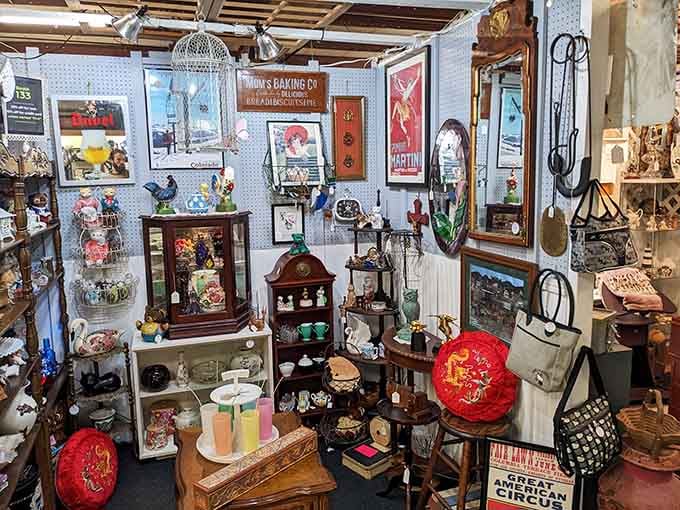 One booth holds a Martini poster, ceramic roosters, and a mantel clock, somehow it all works perfectly.