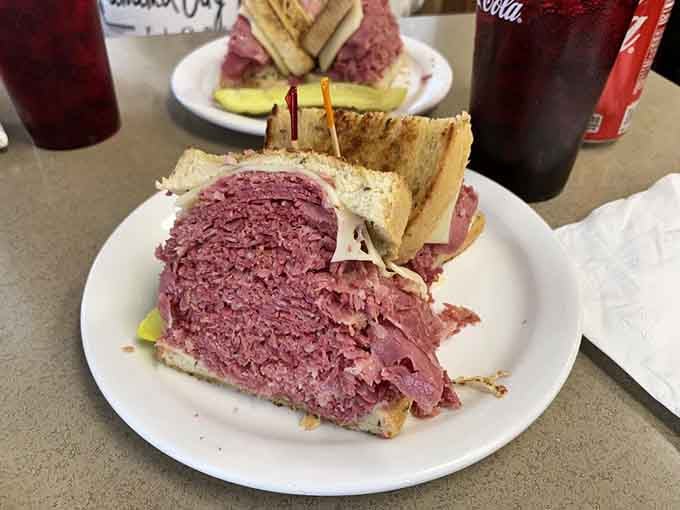 Corned beef piled so high it makes you question everything you thought you knew about sandwiches.