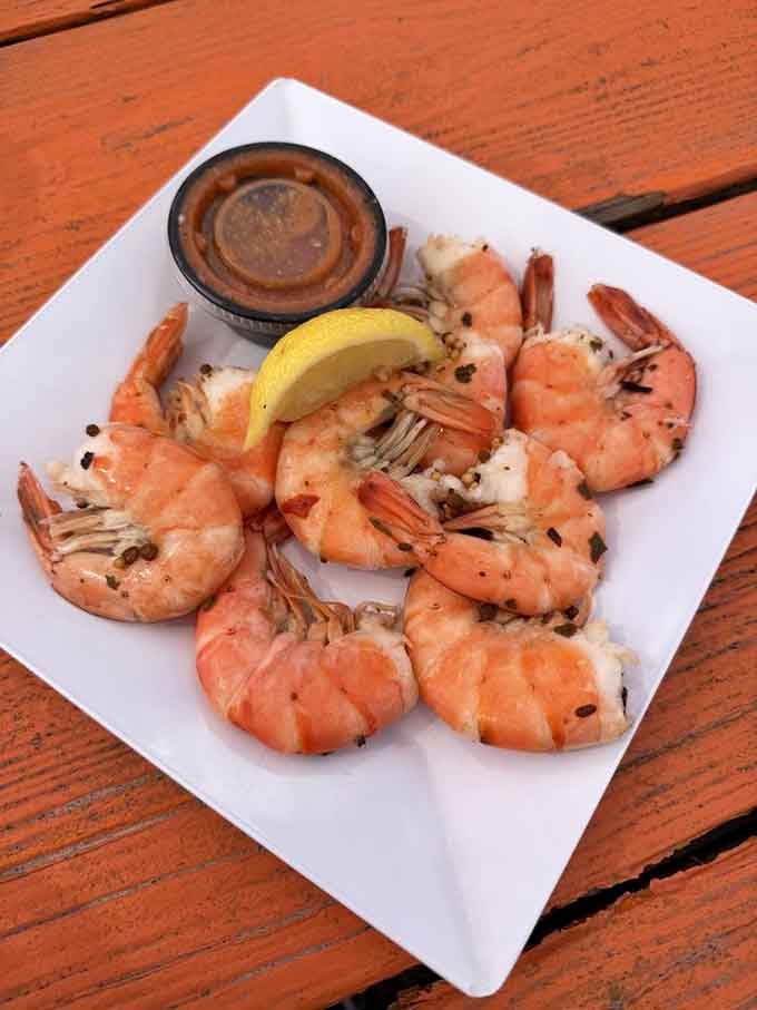Peel and eat shrimp, fresh as the Gulf breeze, served with cocktail sauce and a lemon wedge that means business.