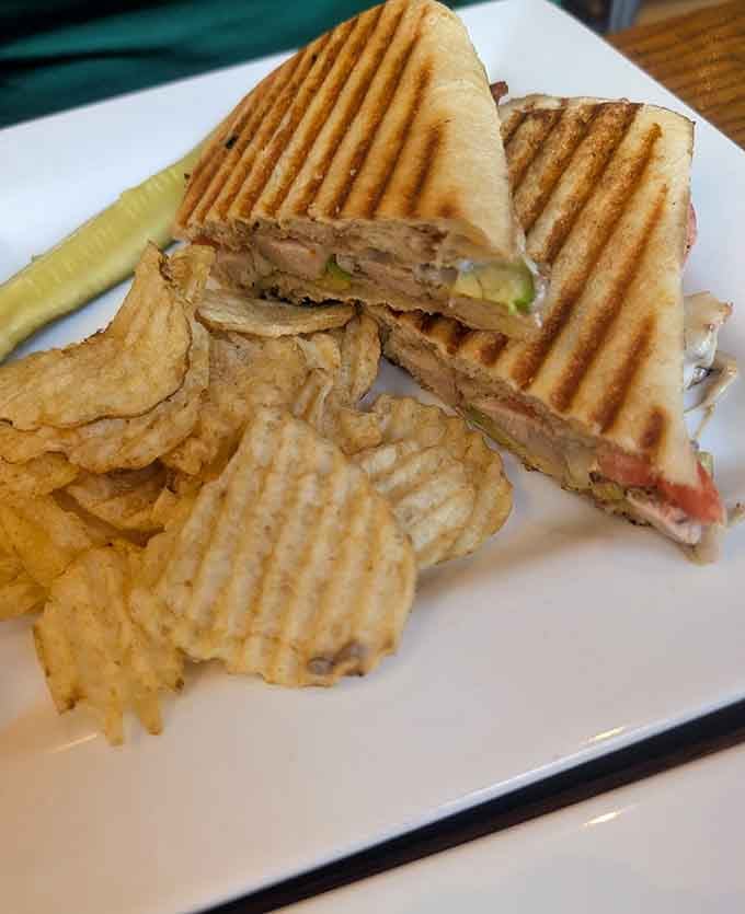 That golden crust and perfectly grilled sandwich might just redefine your expectations for riverside dining excellence.