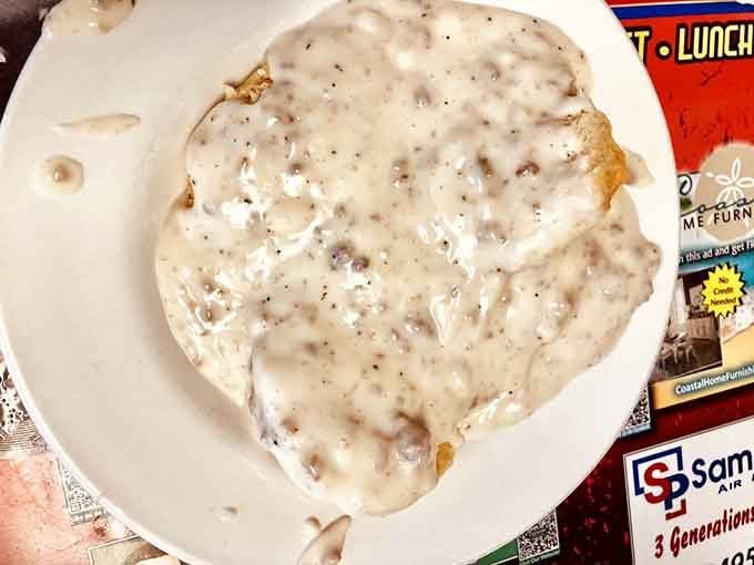 Biscuits and gravy done right, thick, peppery, and generous enough to make you reconsider all your morning plans.