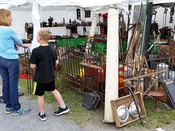 Even the kids know something special is happening here, and that rusty ironwork has everyone's full attention.