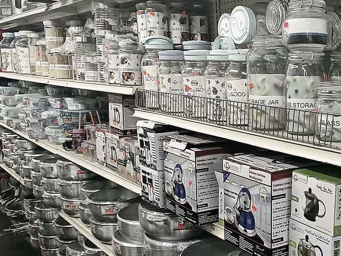 Pots, kettles, glass jars, and storage containers stacked floor to ceiling, basically every kitchen essential your grandmother always told you to own.