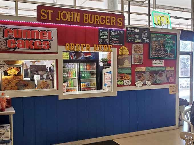 Burgers, funnel cakes, tacos, and elotes all under one roof, this food stall is basically a greatest hits album.