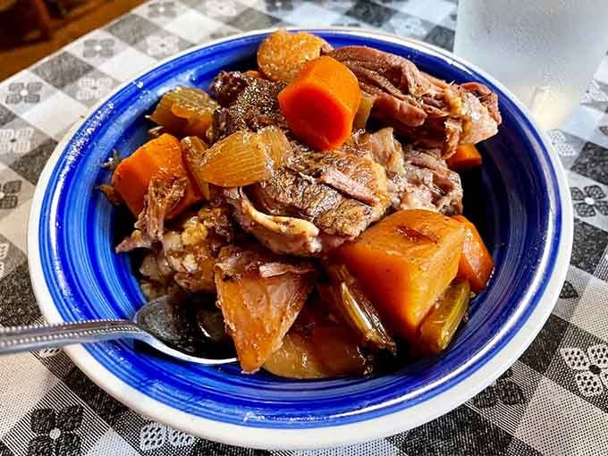 Pot roast with carrots and vegetables, cooked low and slow, the way your grandmother intended it to be done.
