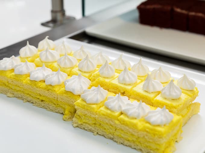 These lemon meringue cake slices are so perfectly arranged, it almost feels wrong to eat them. Almost.