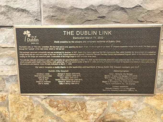 Every great bridge has a story, and this dedication plaque tells one of community vision realized.