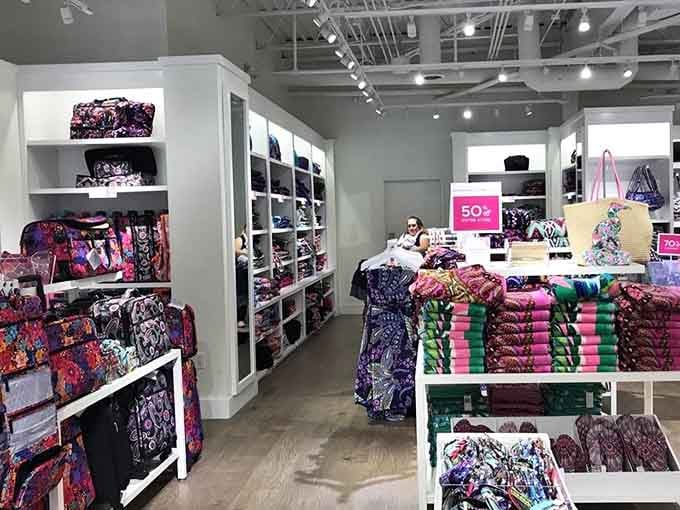 Inside Vera Bradley, where colorful patterns multiply faster than rabbits and your resolve to stick to a budget disappears completely.