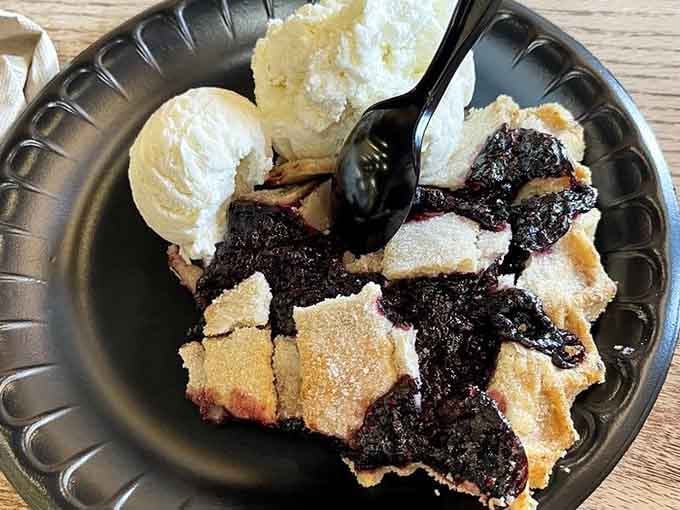 Mixed berry pie topped with homemade ice cream, because some combinations are simply too good to argue with.