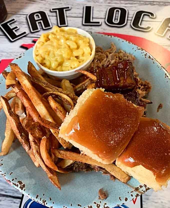 Three meats, two sides, one roll, and absolutely zero regrets waiting for you at the end of this road trip.